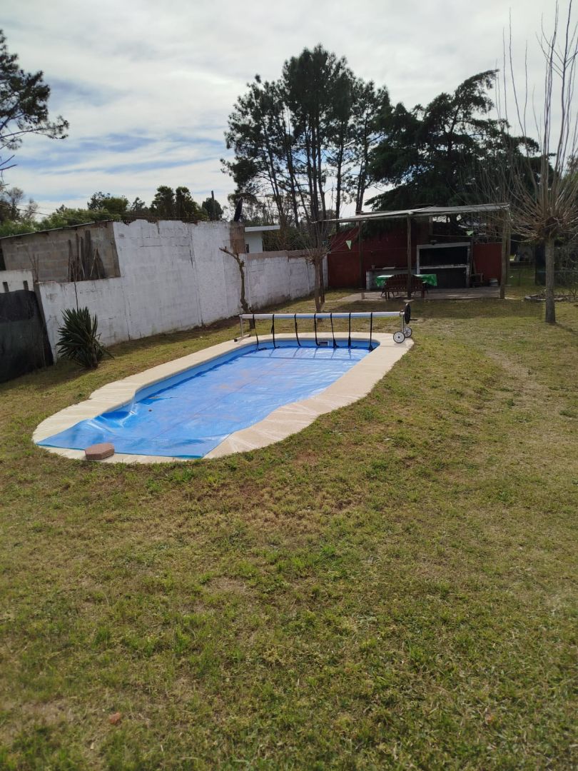 Casa Las Toscas, piscina. Ref #E4529E - infocasas.com.uy