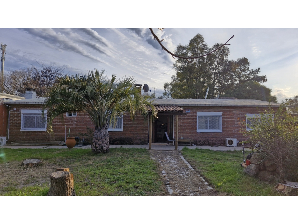 VENDE CASA 2 DORMITORIOS Y TERRENO DE 450 M2 - EL PINAR. Ref #U8BF03 - infocasas.com.uy