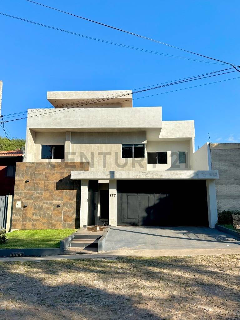 VENDO MODERNA RESIDENCIA EN LAMBARÉ. Ref #O76123 - infocasas.com.py